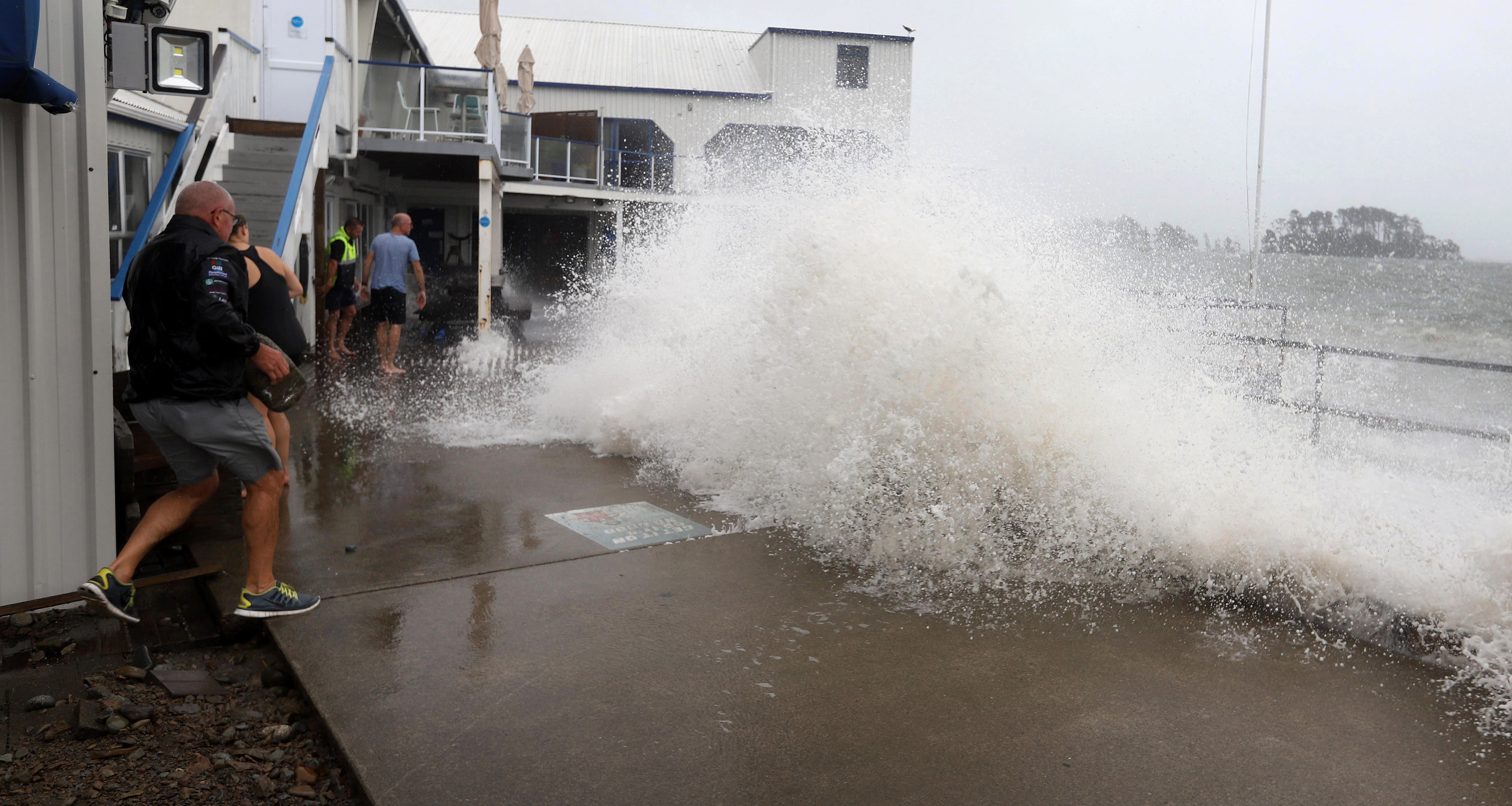 Live: King tides pass safely as Cyclone Fehi clean-up continues